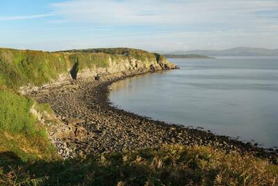 Rigg Bay and Cruggleton Castle, from Garlieston